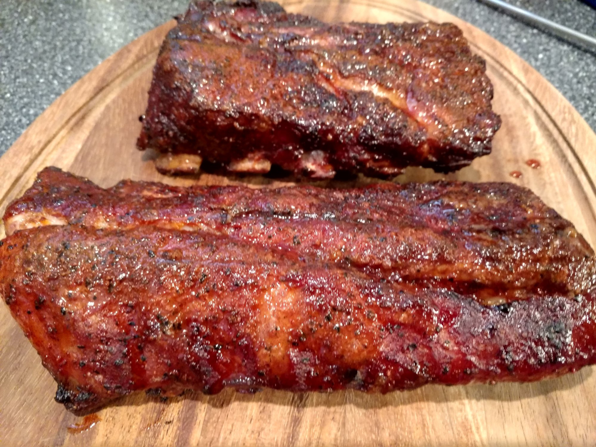 Hard Core Red, got a little rack of ribs going — Big Green Egg Forum