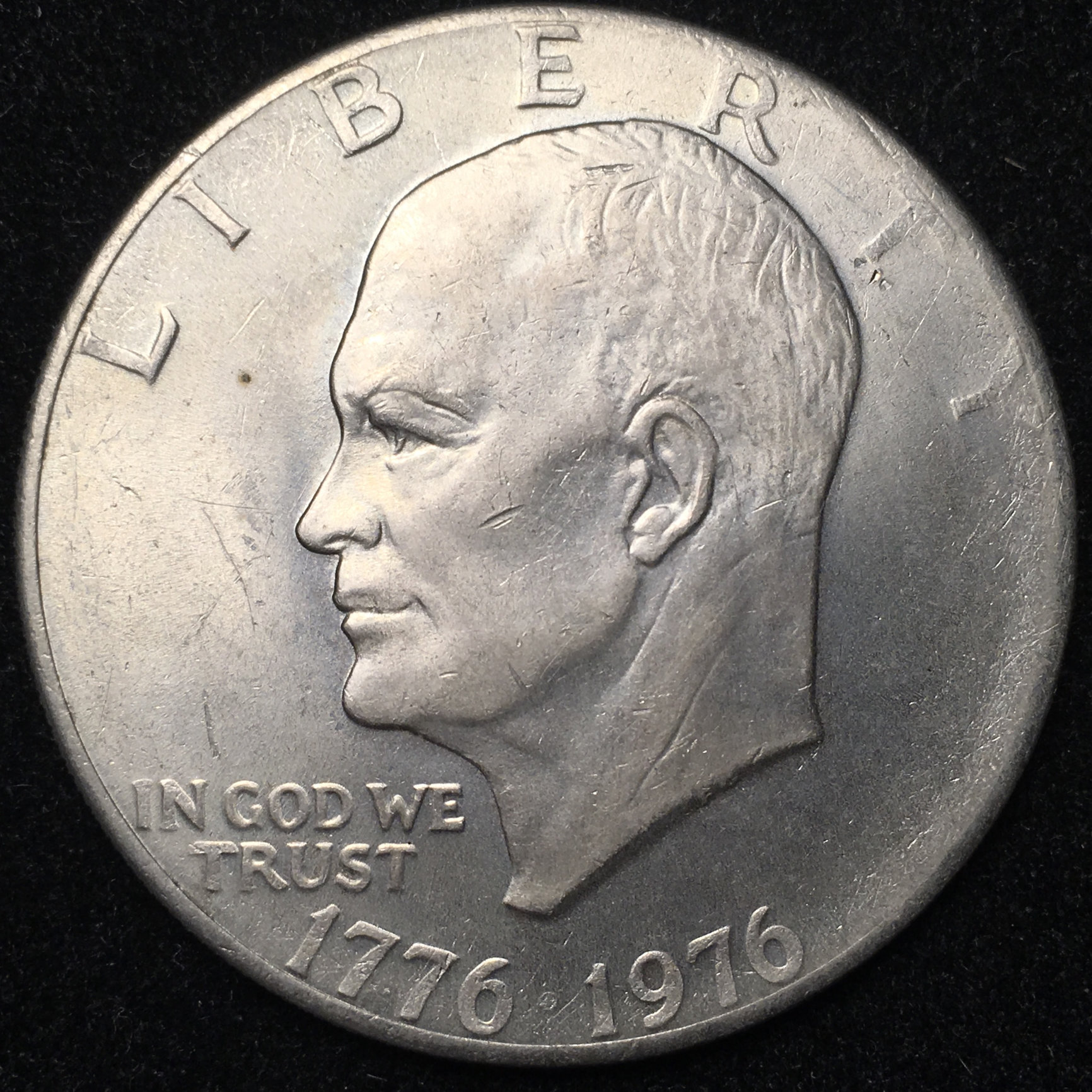 Is this Ike Dollar a die trial strike? Or die alignment strike ...