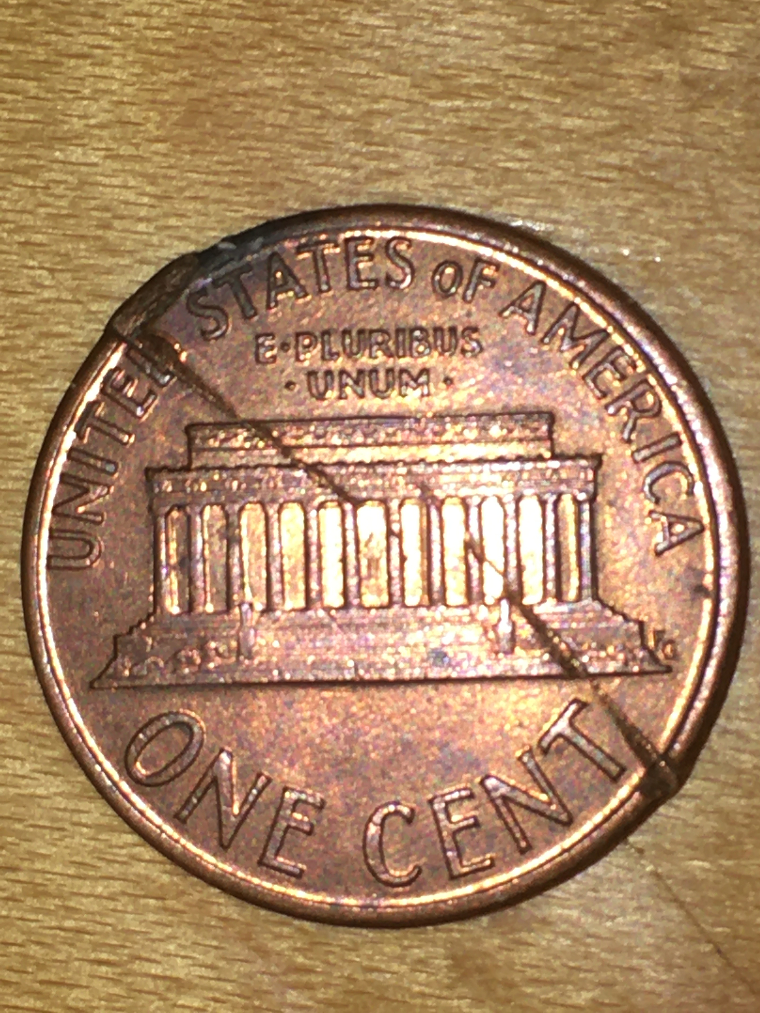 Is this PMD or a possible die/planchet break? — Collectors Universe