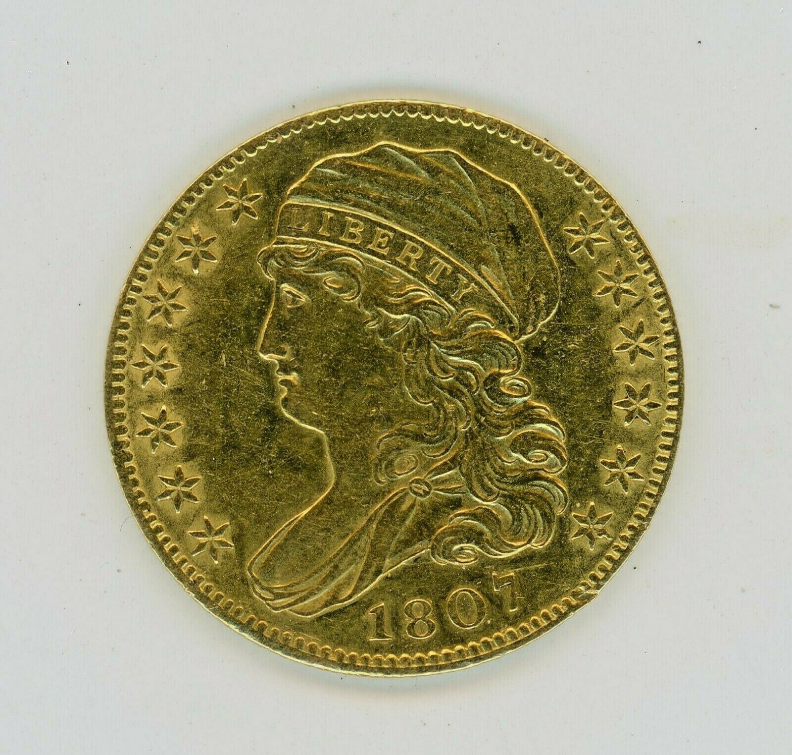 How would you grade and price this early gold? — Collectors Universe