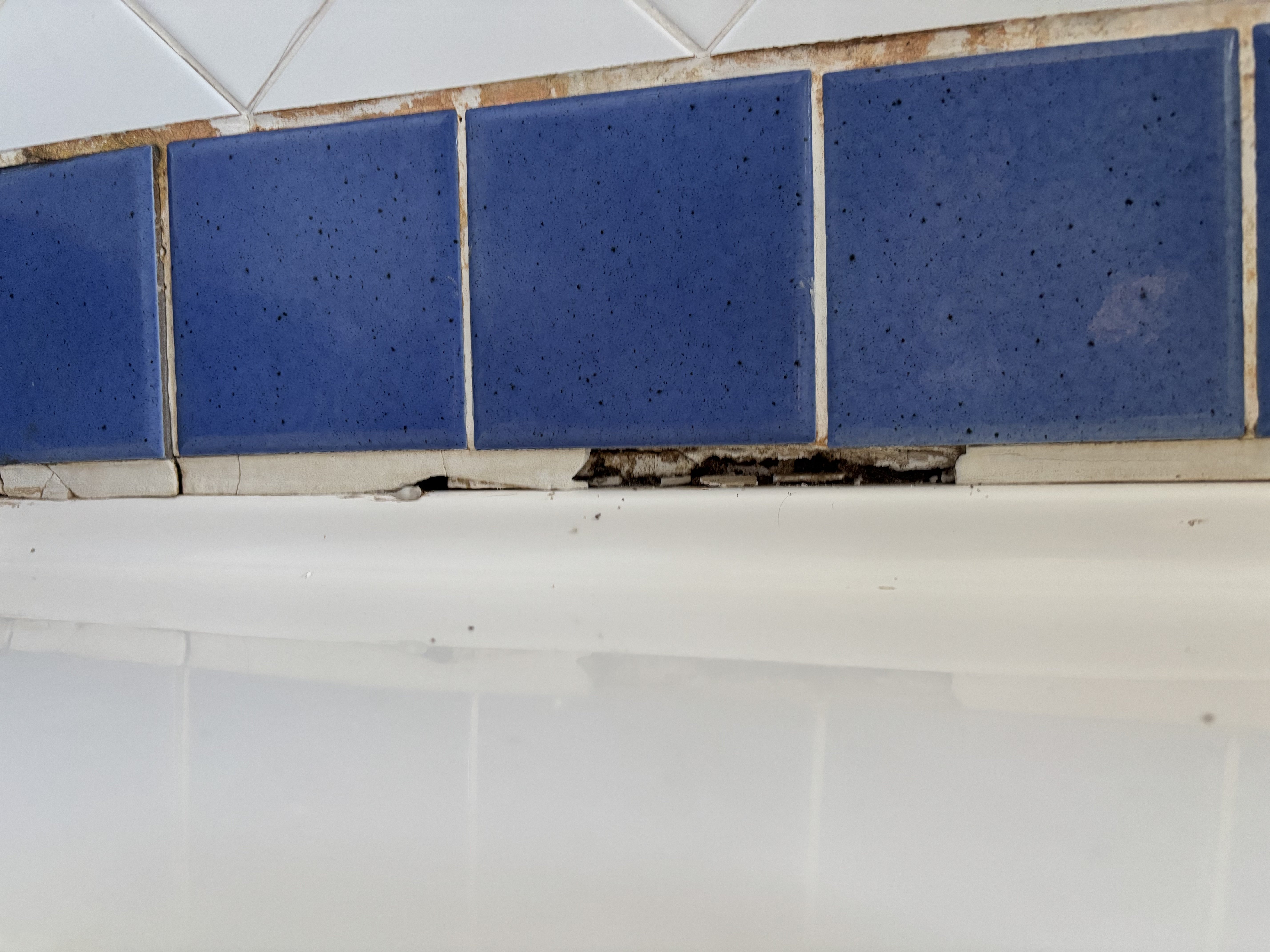 How to fill a large gap between tiles and shower floor? - Bunnings ...