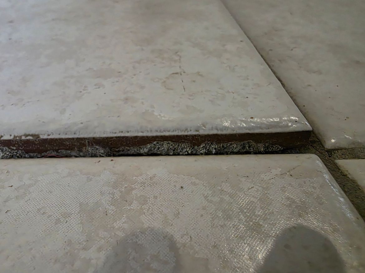 How to fix lifted floor tile? - Bunnings Workshop community