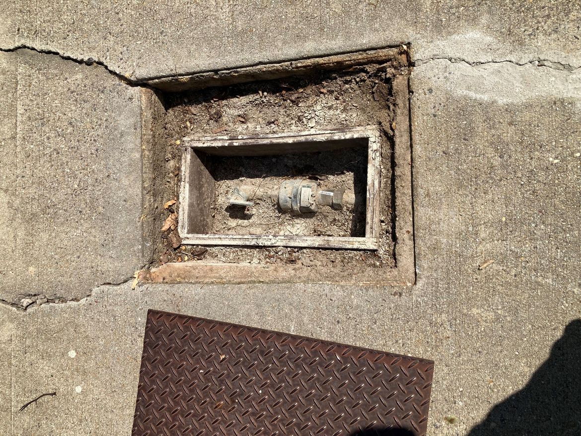 How to fix concrete around water meter hole? - Bunnings Workshop community