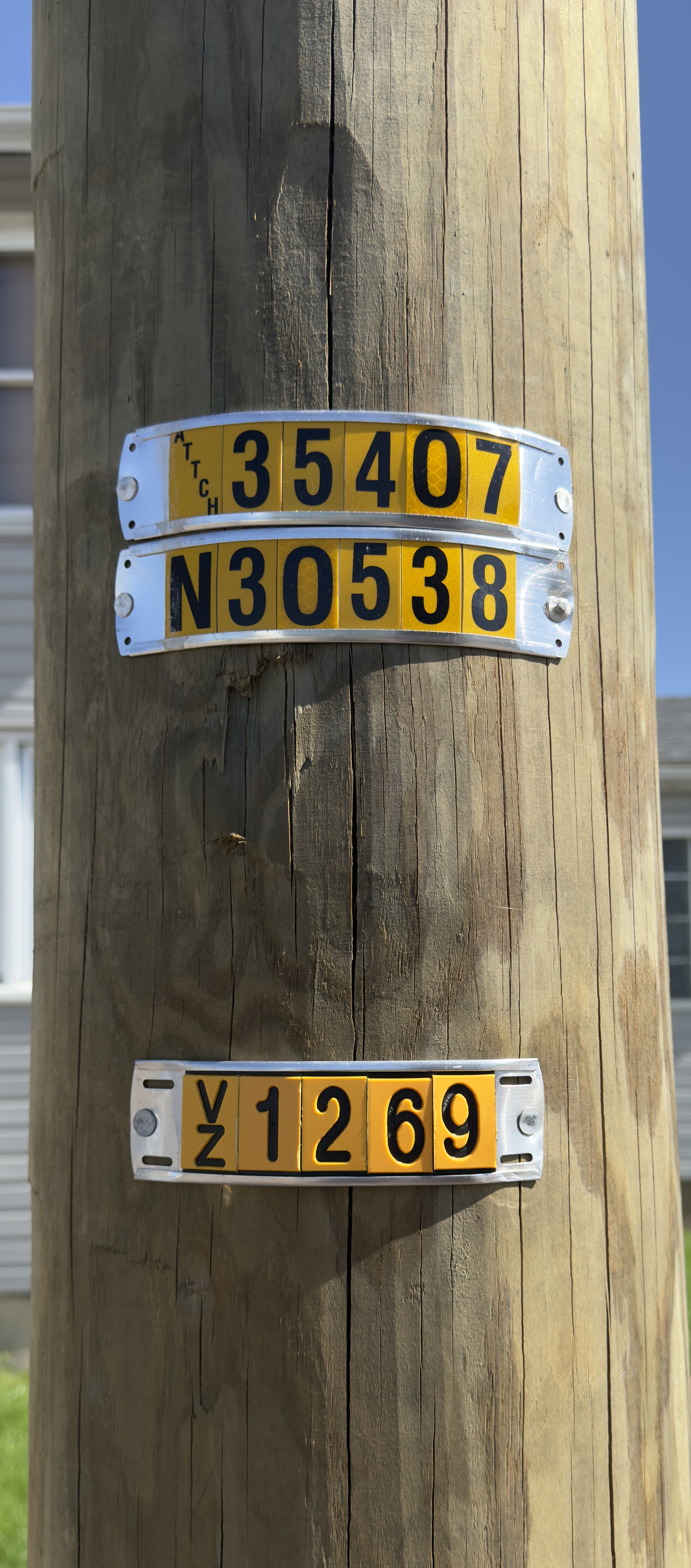 Utility pole leaning into roadway - verizon